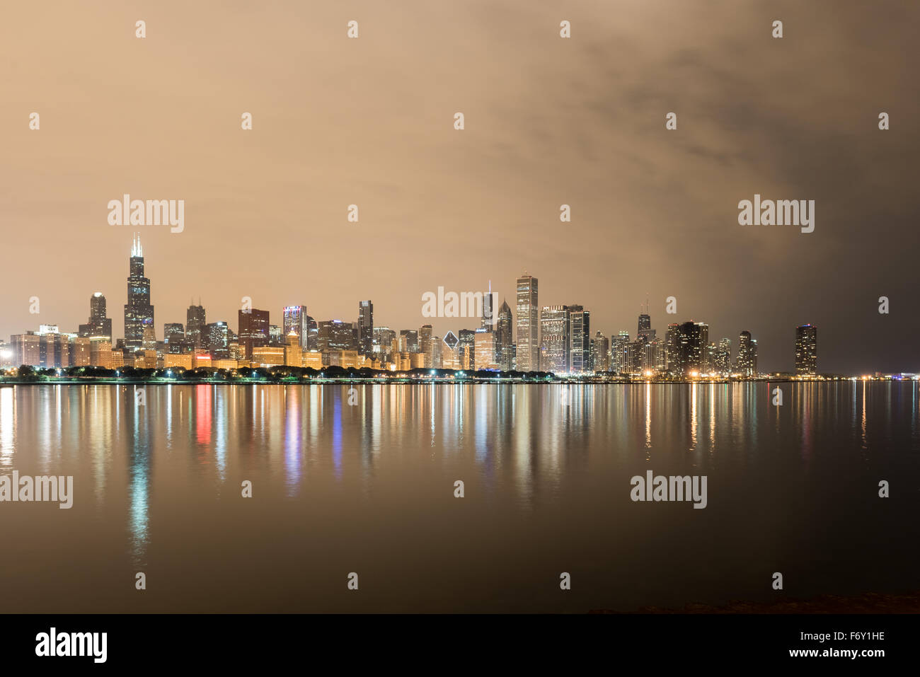 View of the Chicago Skyline over Lake Michigan at night Stock Photo - Alamy