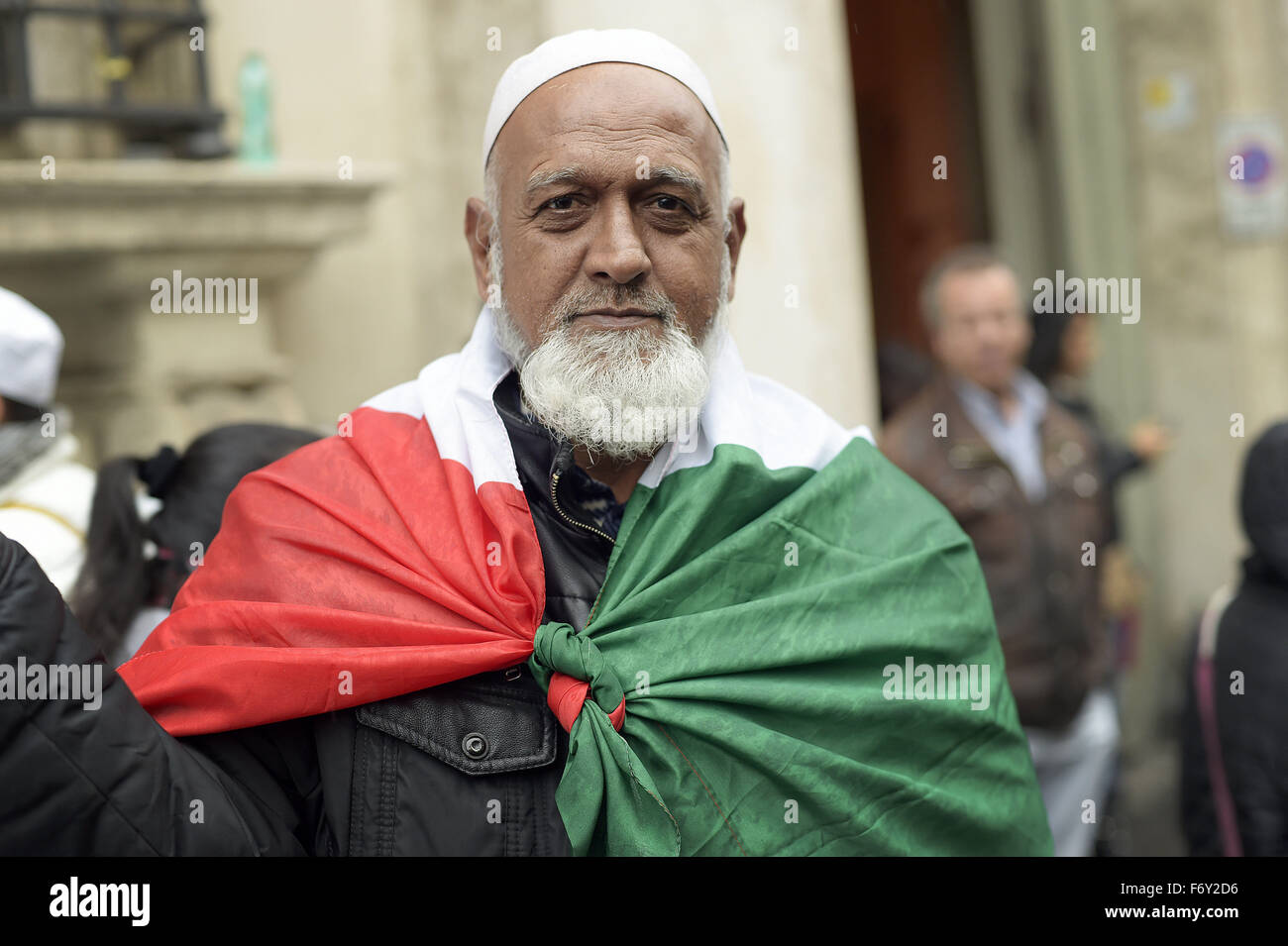 Rome, Italy. 21st Nov, 2015. A Muslim man wearing an Italian Flag ...
