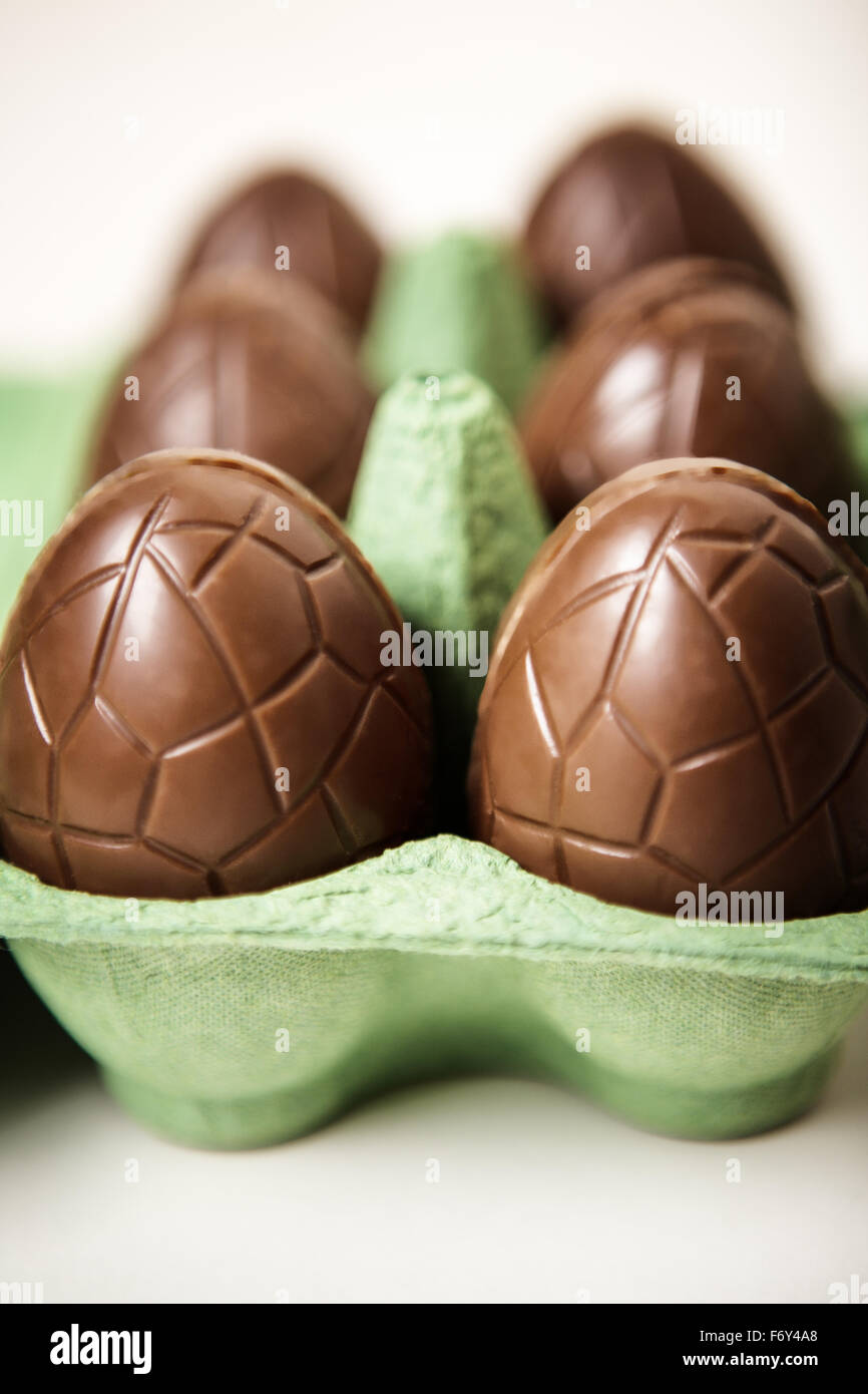 small chocolate eggs sitting in a cardboard egg box Stock Photo - Alamy