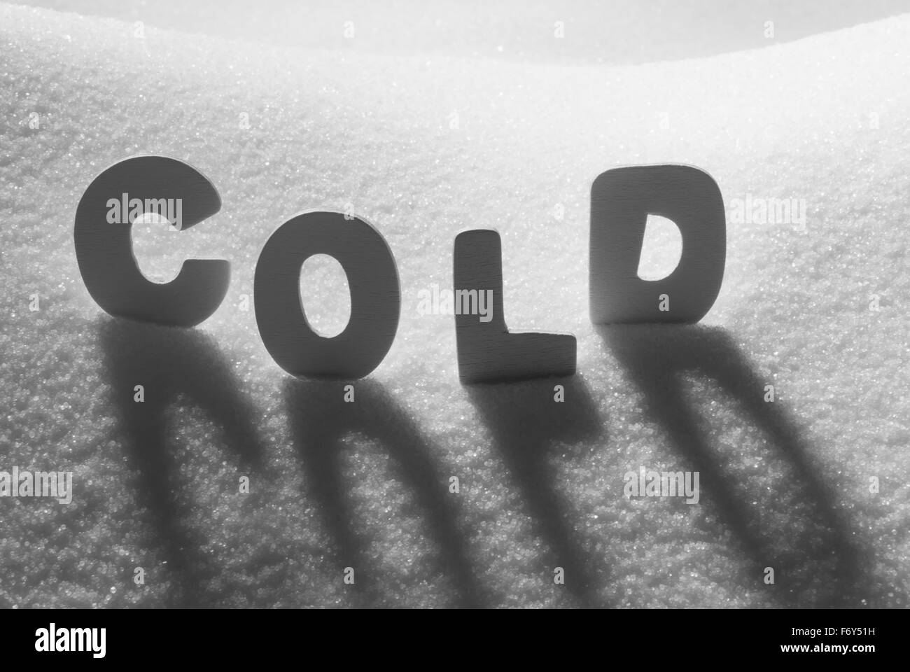 White Word Cold On Snow Stock Photo - Alamy