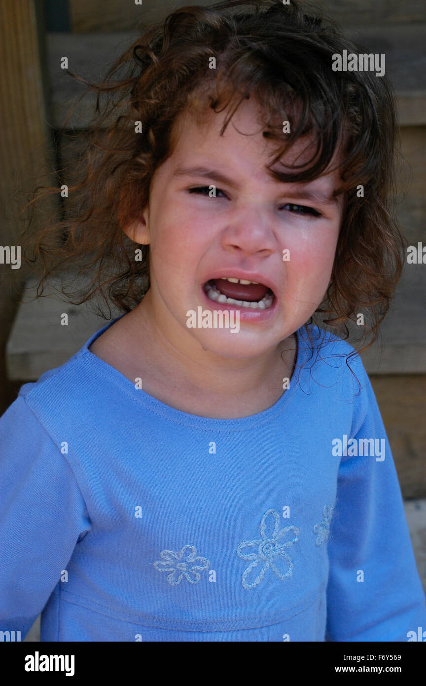Young girl having a temper tantrum Stock Photo - Alamy