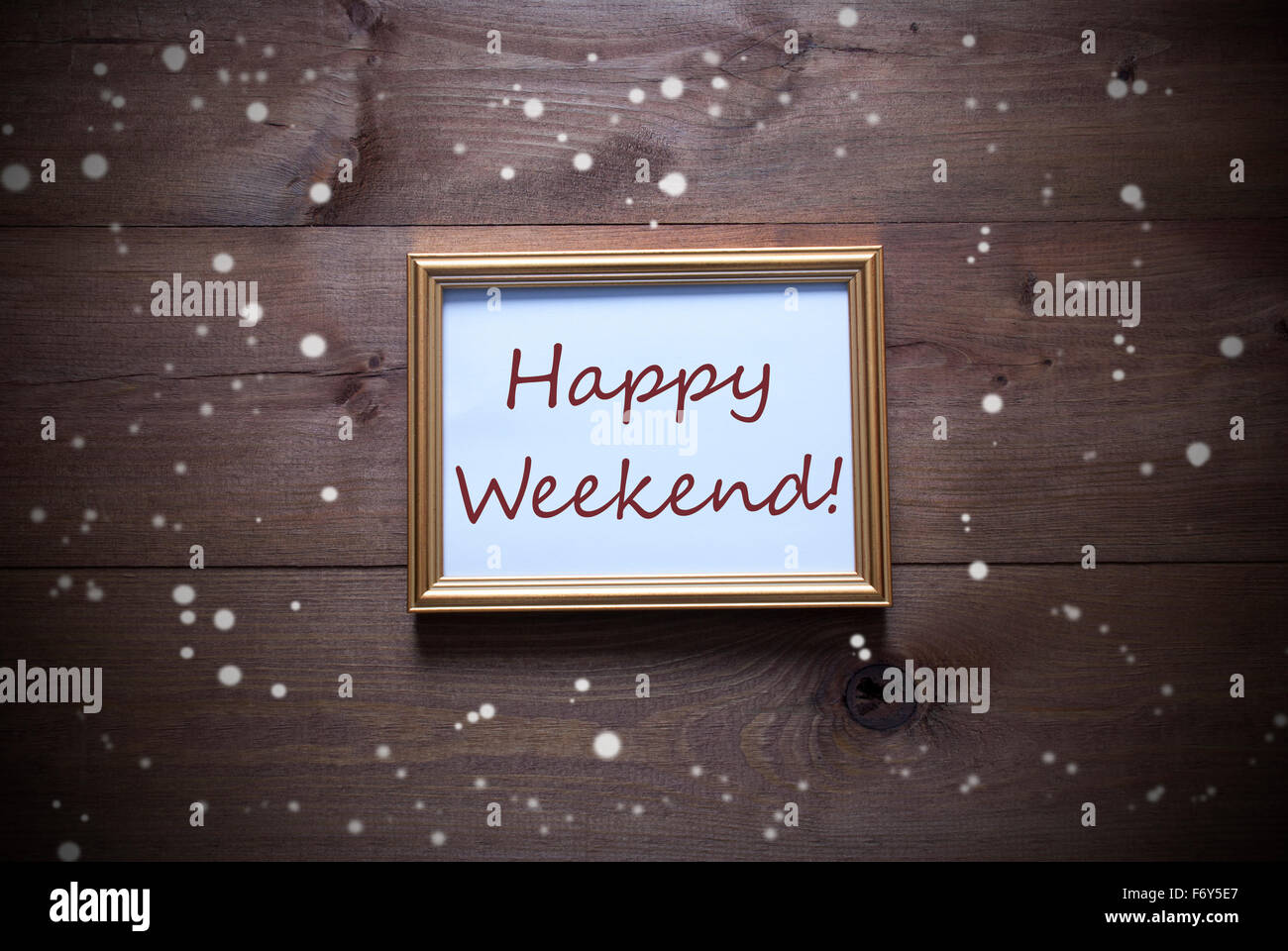 Golden Picture Frame With Happy Weekend And Snowflakes Stock Photo - Alamy