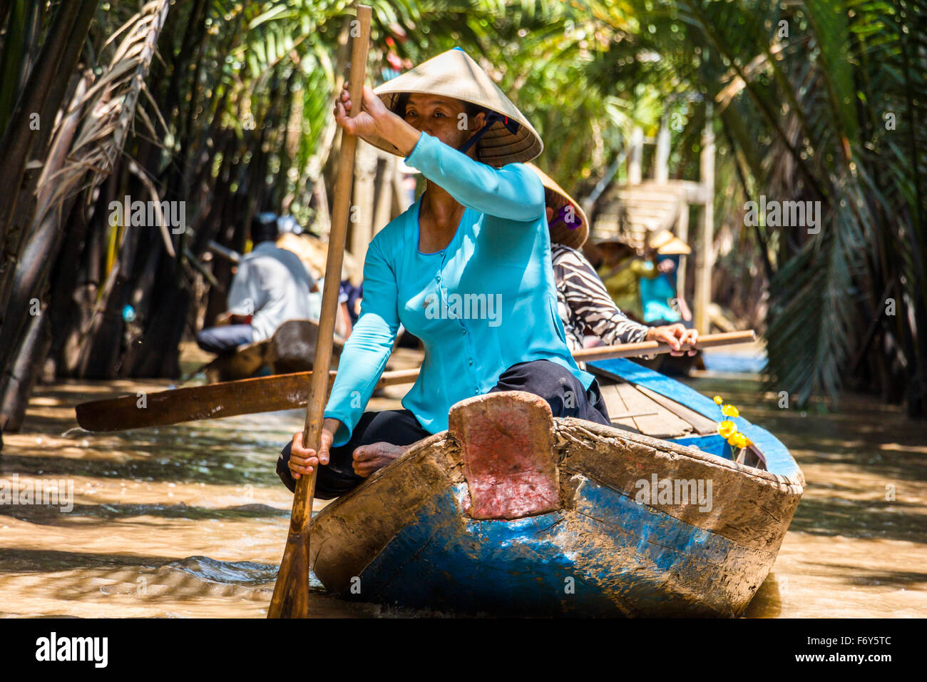 Small boats on Mekong River Delta Stock Photo - Alamy