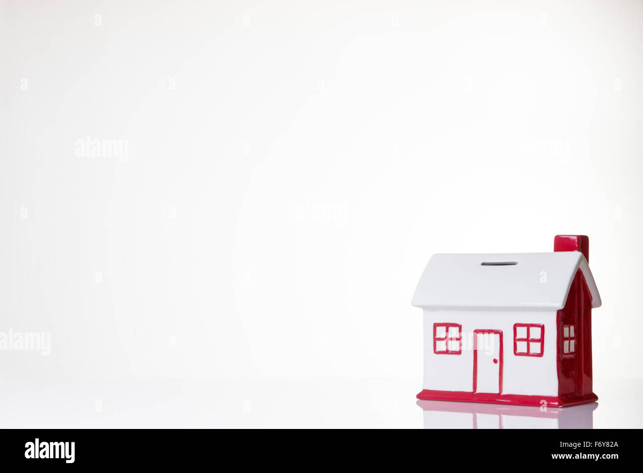 money box in the shape of a house Stock Photo - Alamy