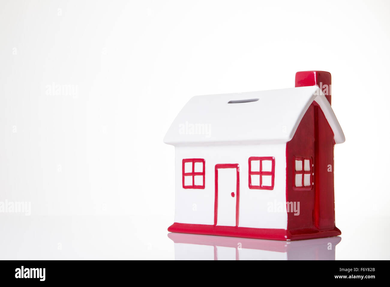 money box in the shape of a house Stock Photo - Alamy