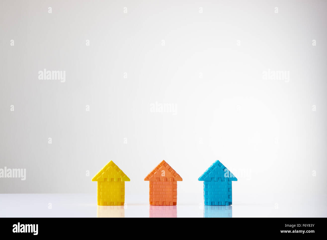 kids building blocks made into a shape of a house Stock Photo - Alamy