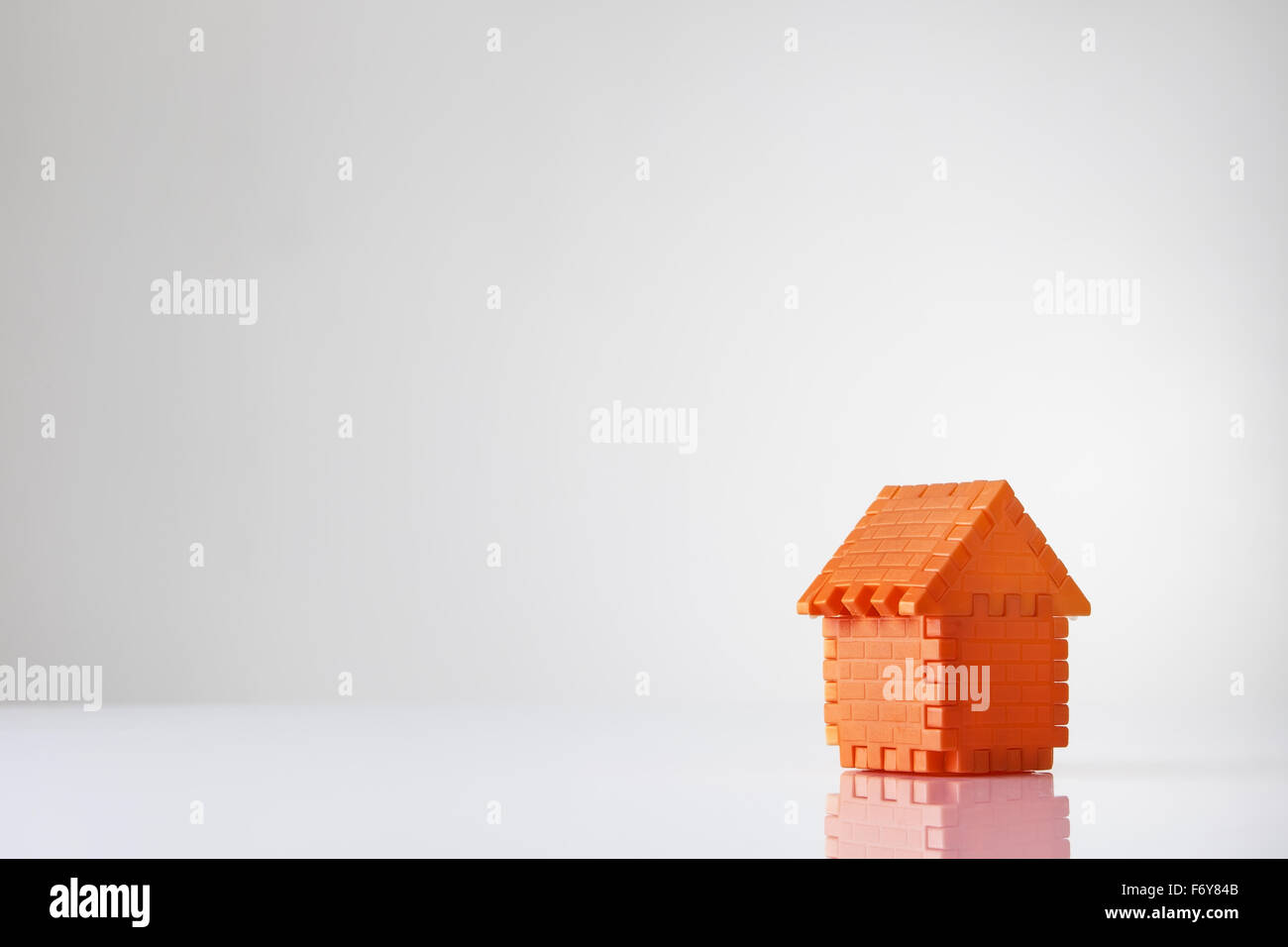 kids building blocks made into a shape of a house Stock Photo - Alamy