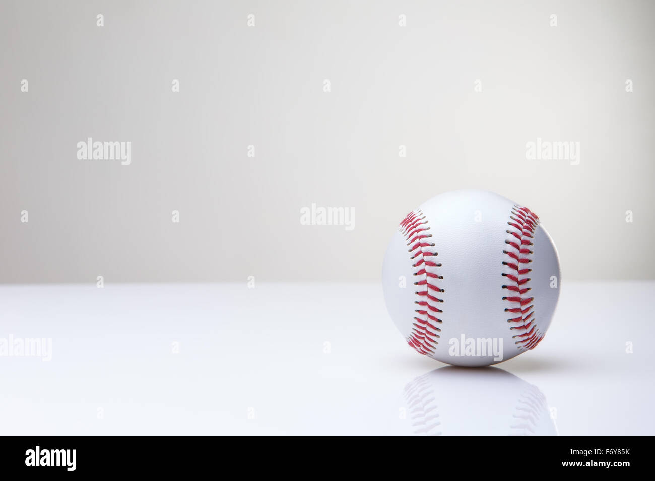 single base ball shot in the studio on white perspex background Stock ...