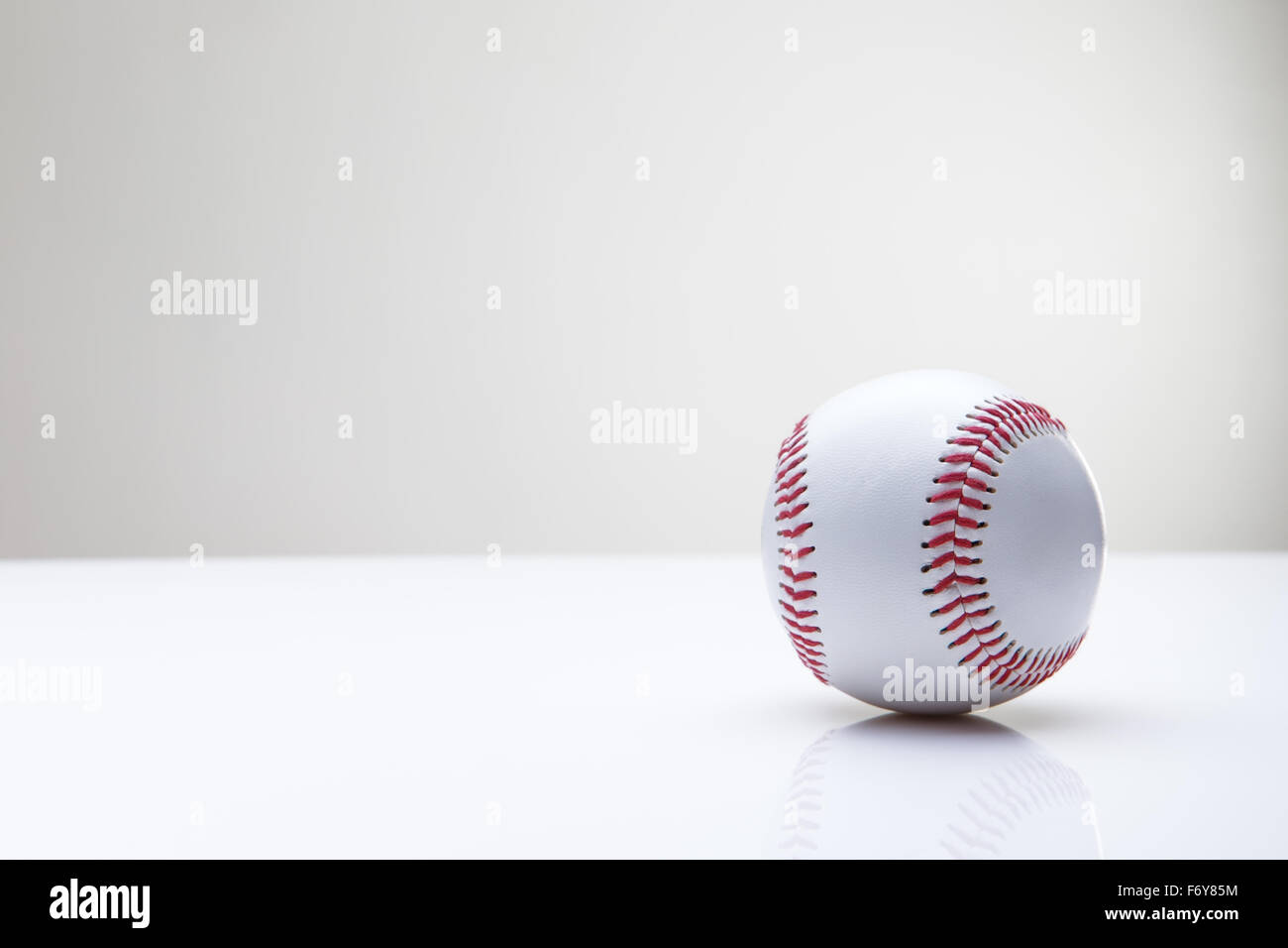 single base ball shot in the studio on white perspex background Stock ...