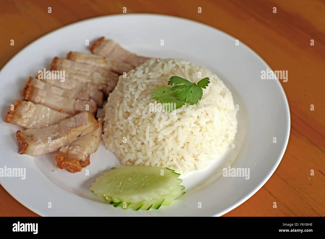 crispy pork with rice, crispy roasted belly pork Stock Photo - Alamy