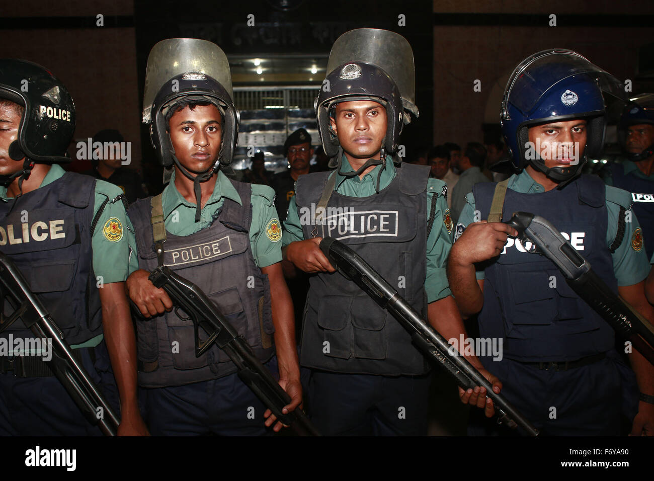 Dhaka, Bangladesh. 21st Nov, 2015. Bangladeshi security personnel stand ...