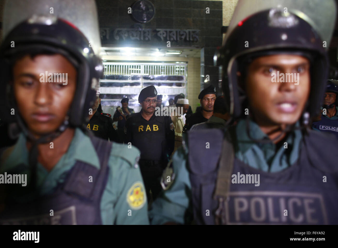 Dhaka, Bangladesh. 21st Nov, 2015. Bangladeshi security personnel stand ...