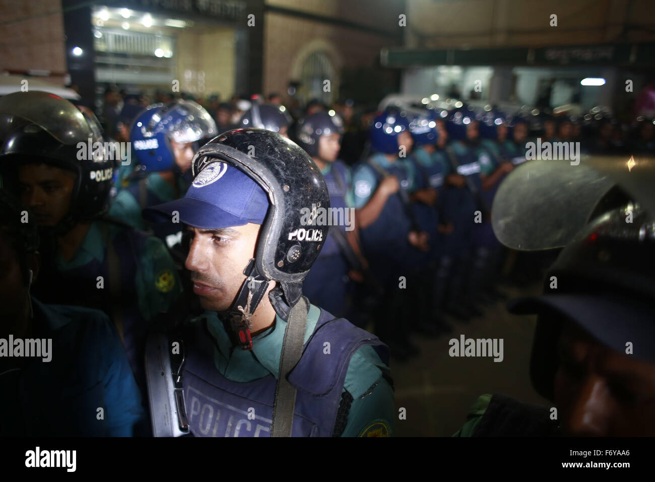 Dhaka, Bangladesh. 21st Nov, 2015. Bangladeshi security personnel stand ...