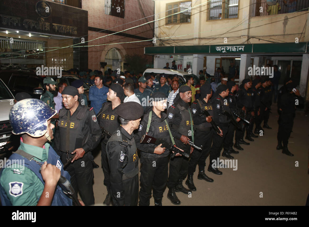 Dhaka, Bangladesh. 21st Nov, 2015. Bangladeshi security personnel stand ...