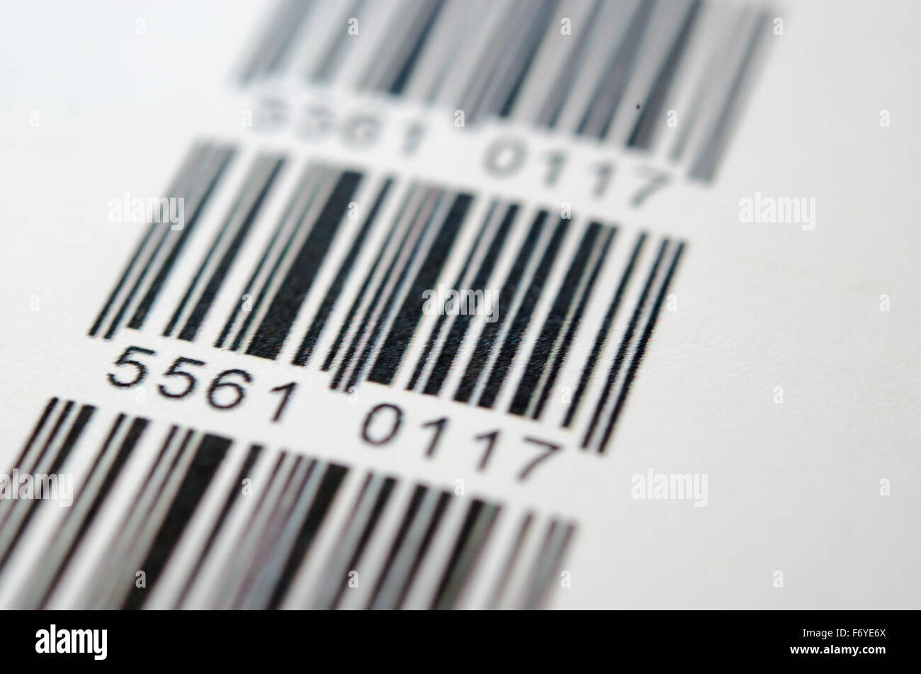 Digital bar code scanned over white background Stock Photo - Alamy