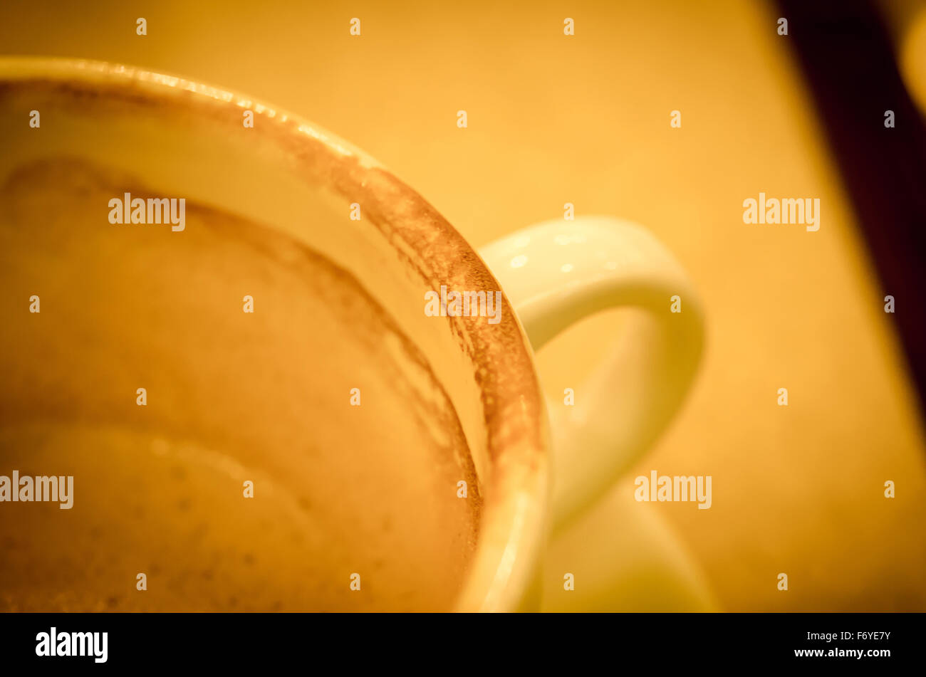 dirty coffee cups.Vintage style color effect.Focus on the glass Stock ...