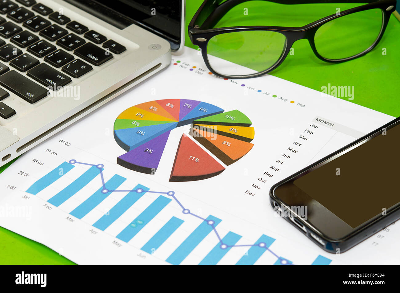 business workplace and computer and printed data sheet Stock Photo - Alamy