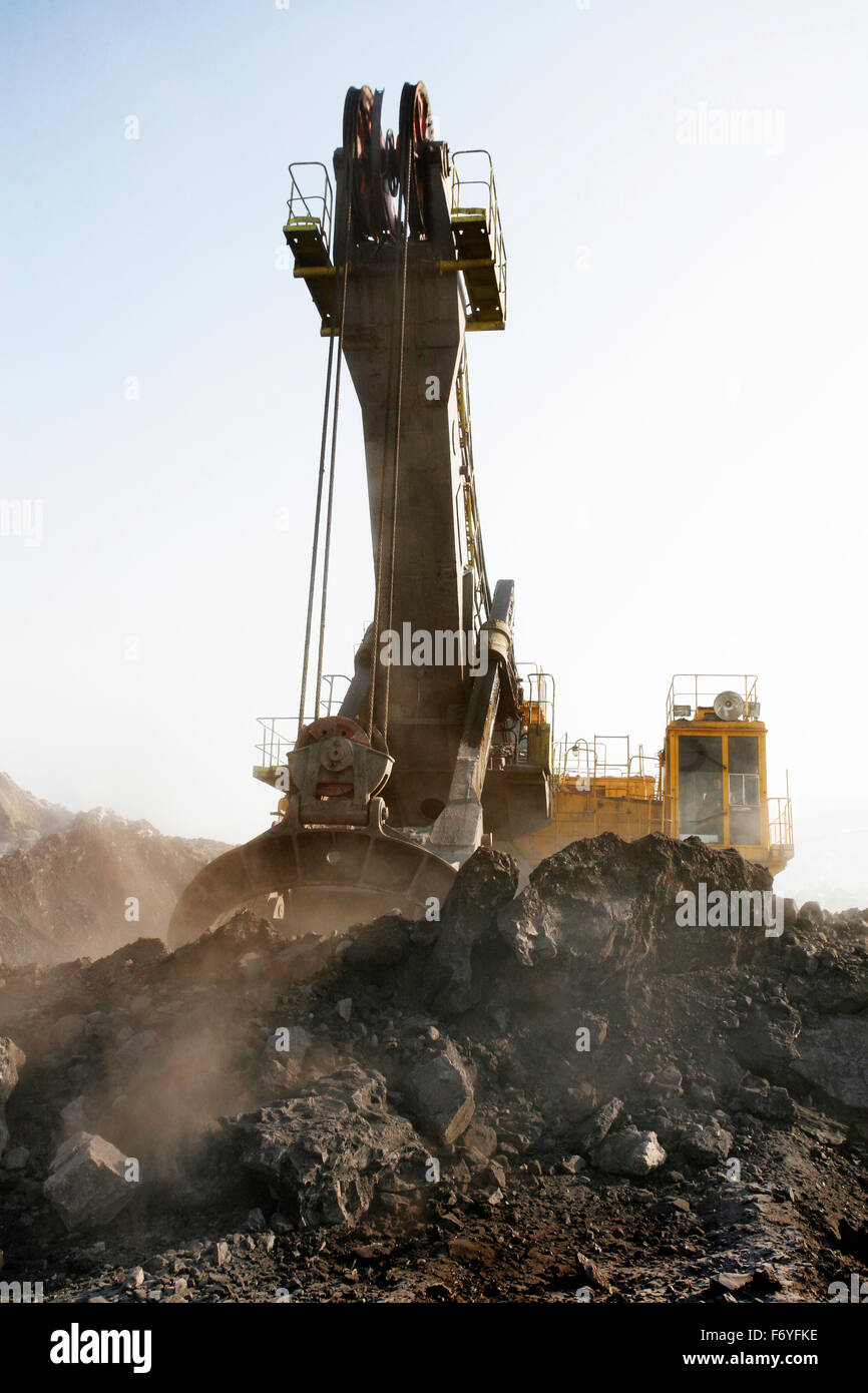 Mine excavator at work Stock Photo - Alamy