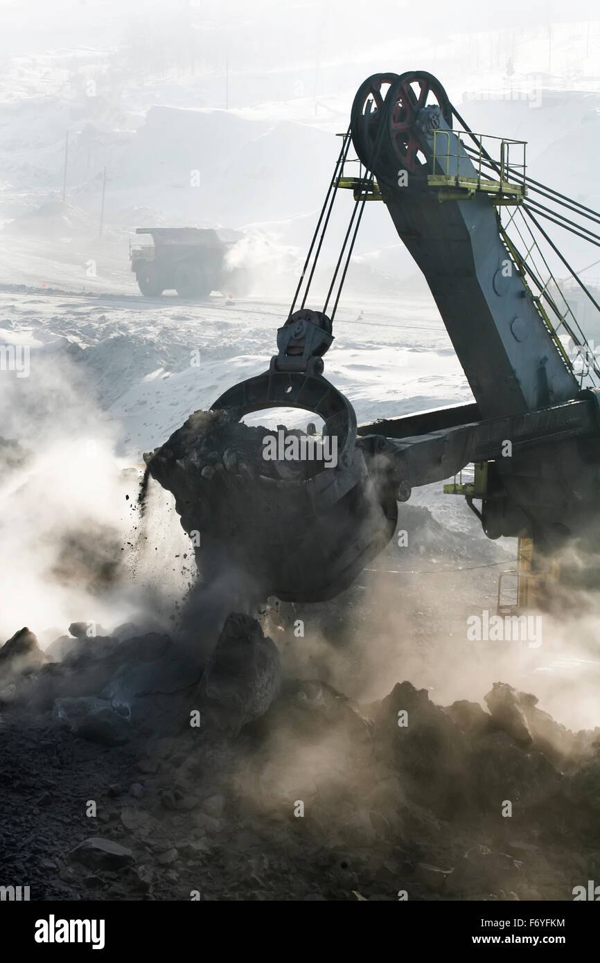 Mine excavator at work Stock Photo - Alamy