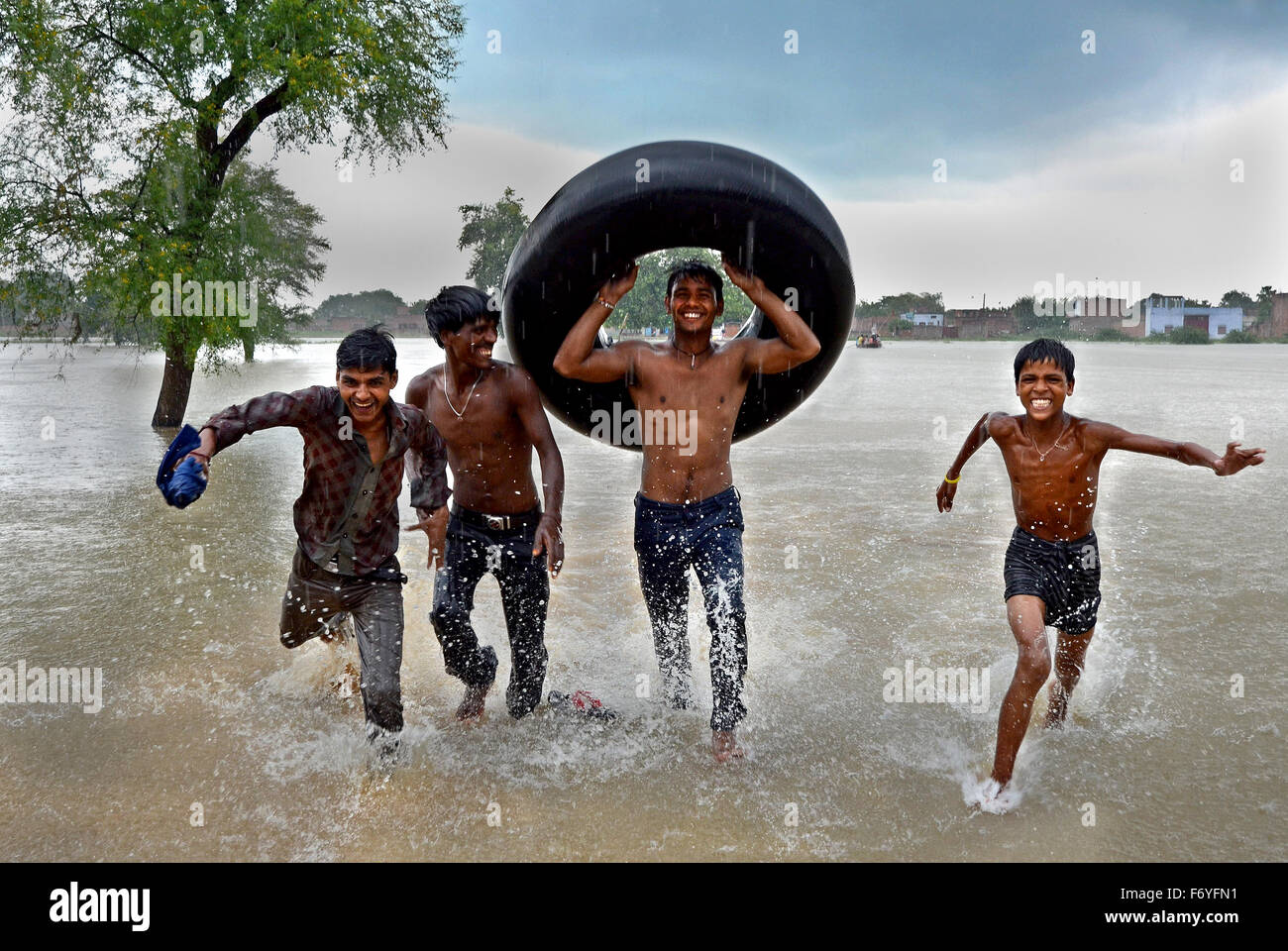The rural village children are enjoying in the flood area at Varanasi ...
