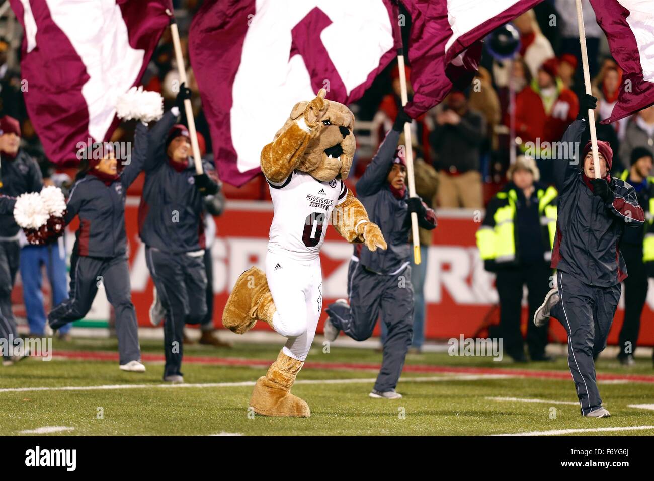 NOV 21, 2015: The Mississippi State Bulldog mascot brings the team onto ...