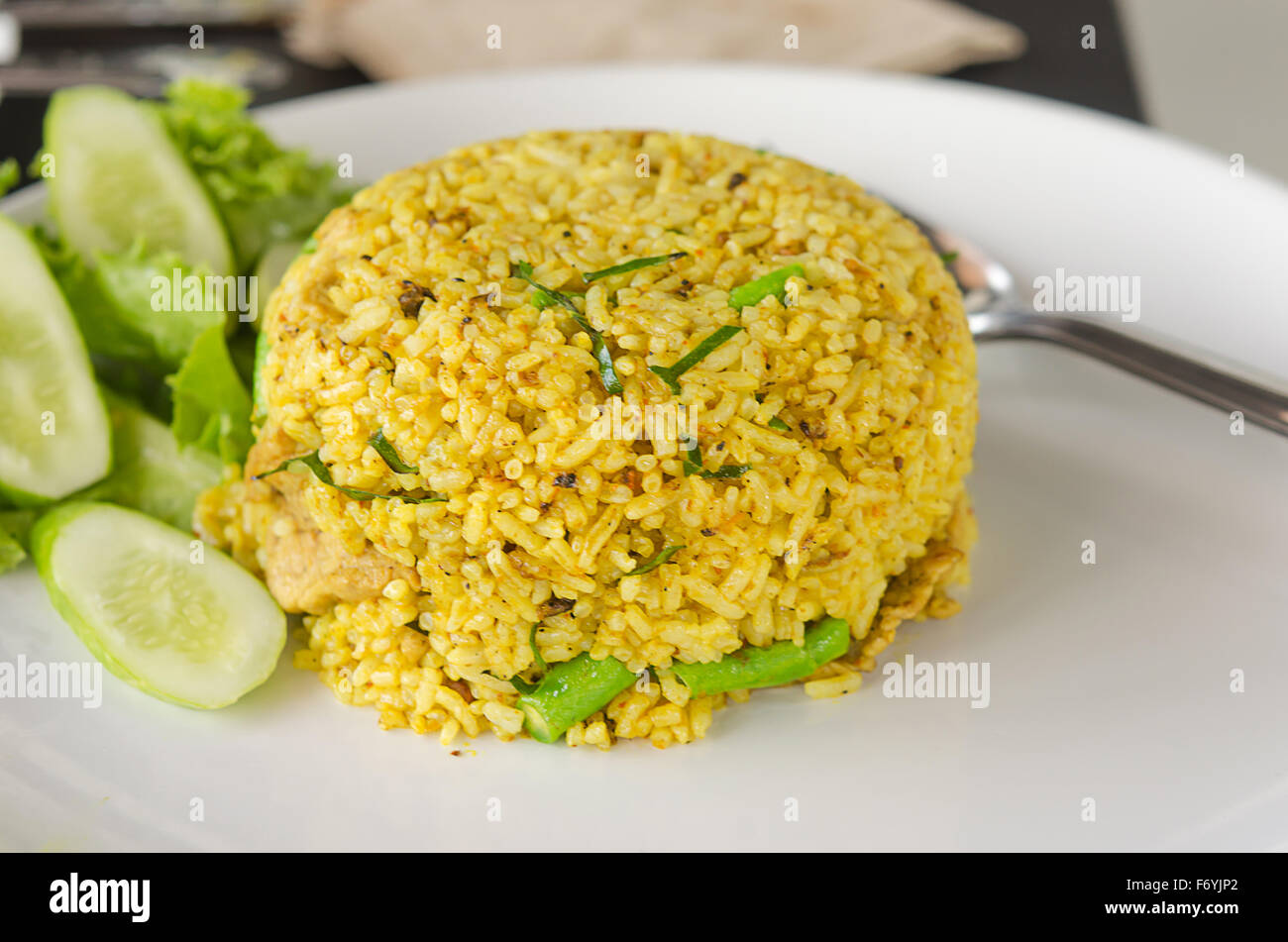 Curry Fried Rice a plate Stock Photo - Alamy