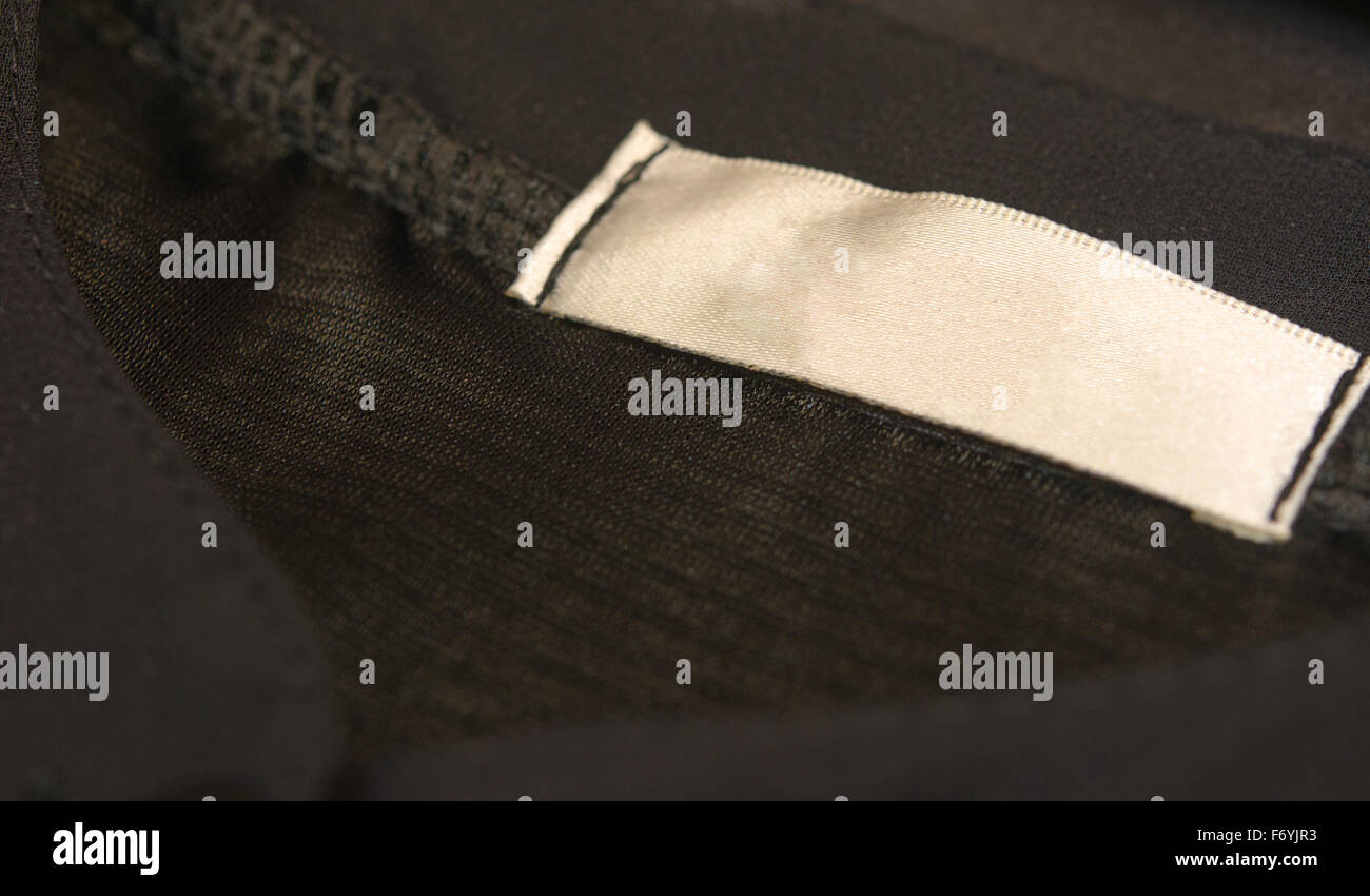Clothing label inside of shirt Stock Photo - Alamy