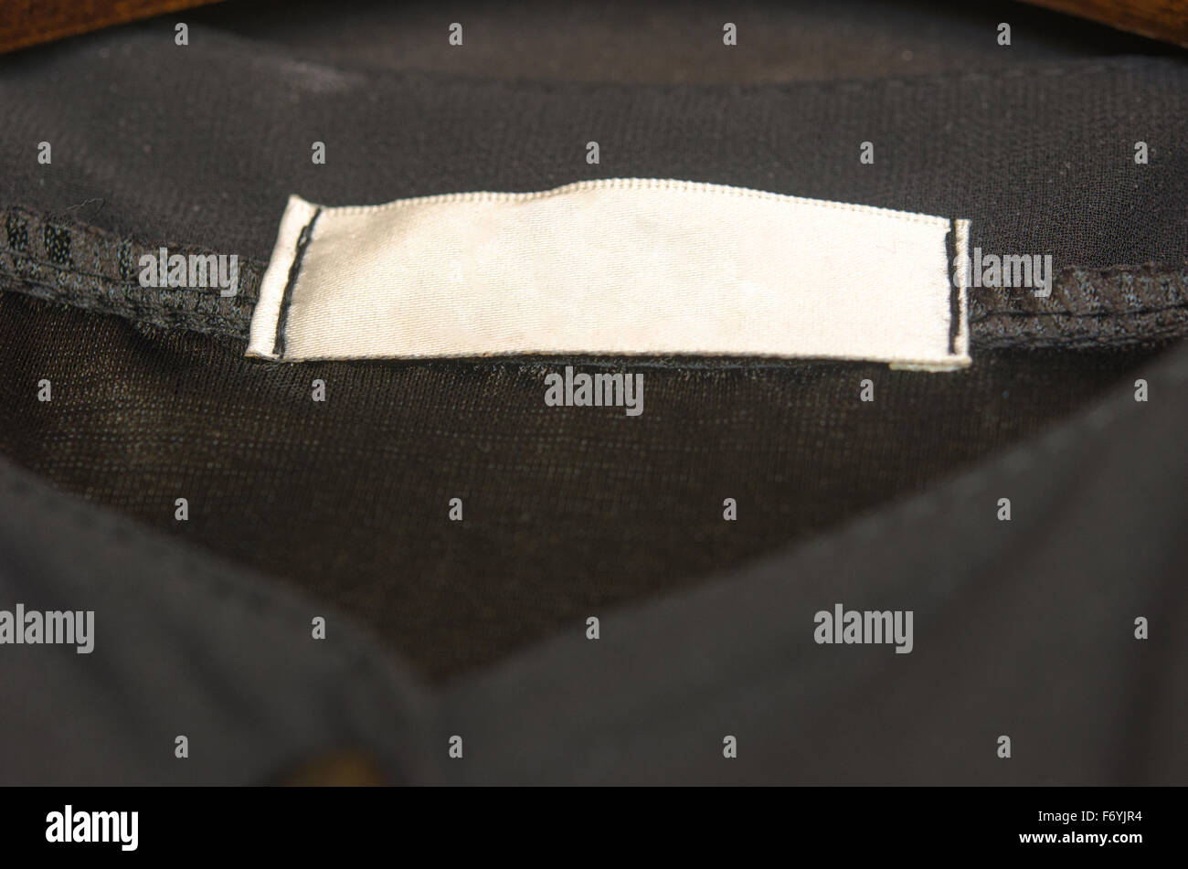Clothing label inside of shirt Stock Photo - Alamy