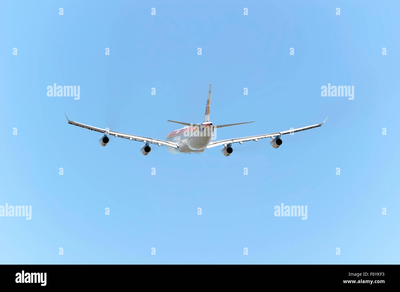 Rear aerial view of aircraft -Airbus A340-313-, of -Iberia- airline. It ...