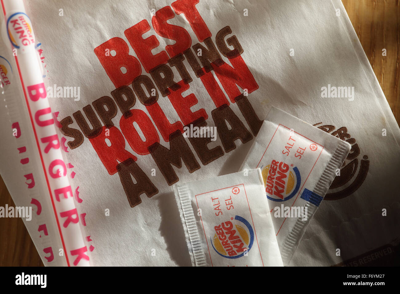 Burger King fries with salt sachets and straw Stock Photo - Alamy
