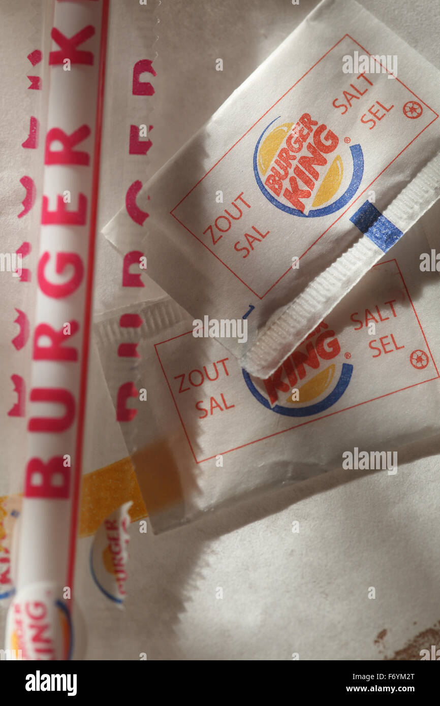 Burger King fries with salt sachets and straw Stock Photo - Alamy