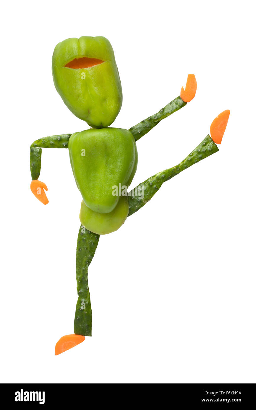 Vegetable ninja kicks with leg on isolated background Stock Photo - Alamy