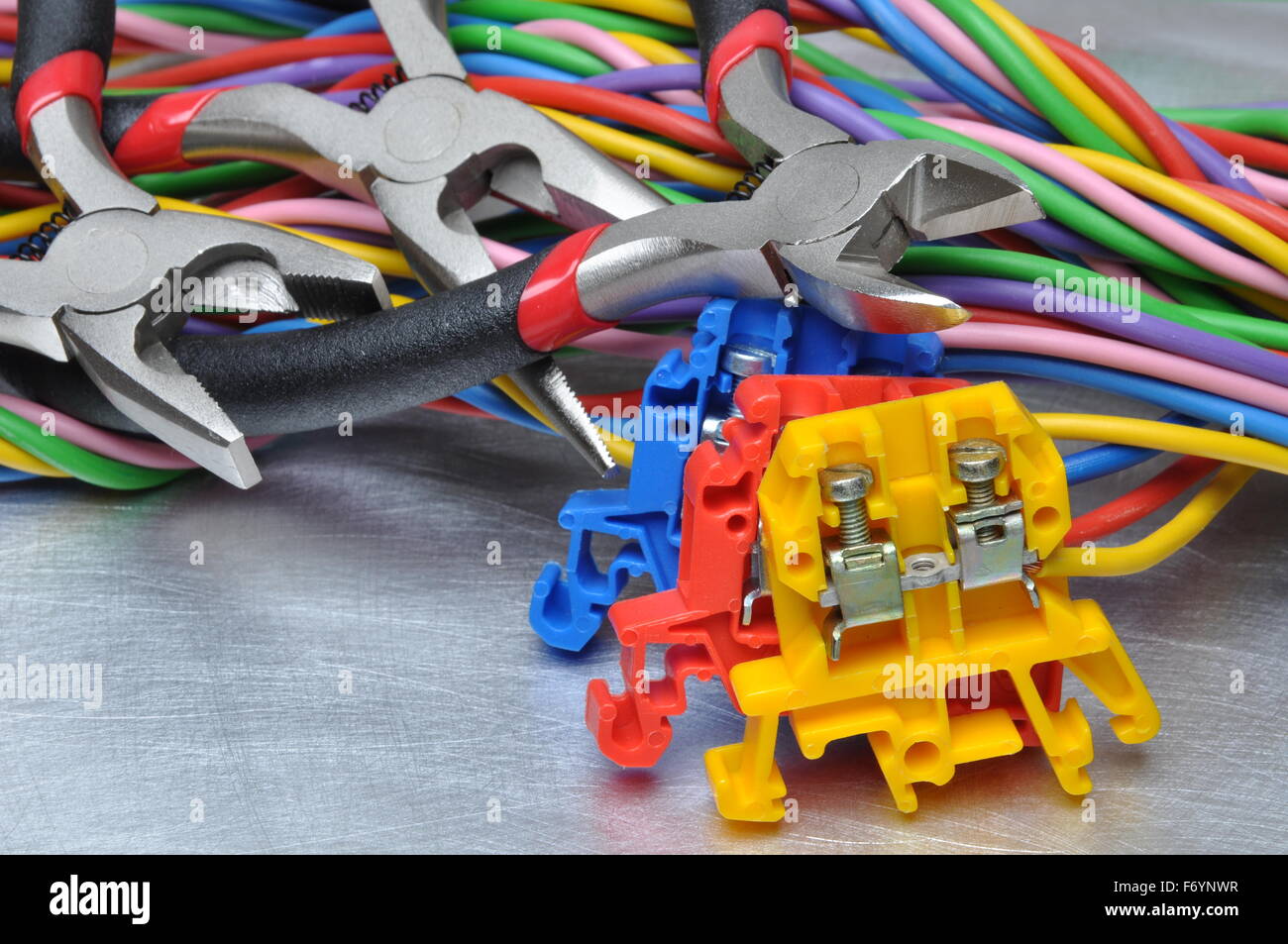 Set of electrical tools and cables on metal surface Stock Photo - Alamy
