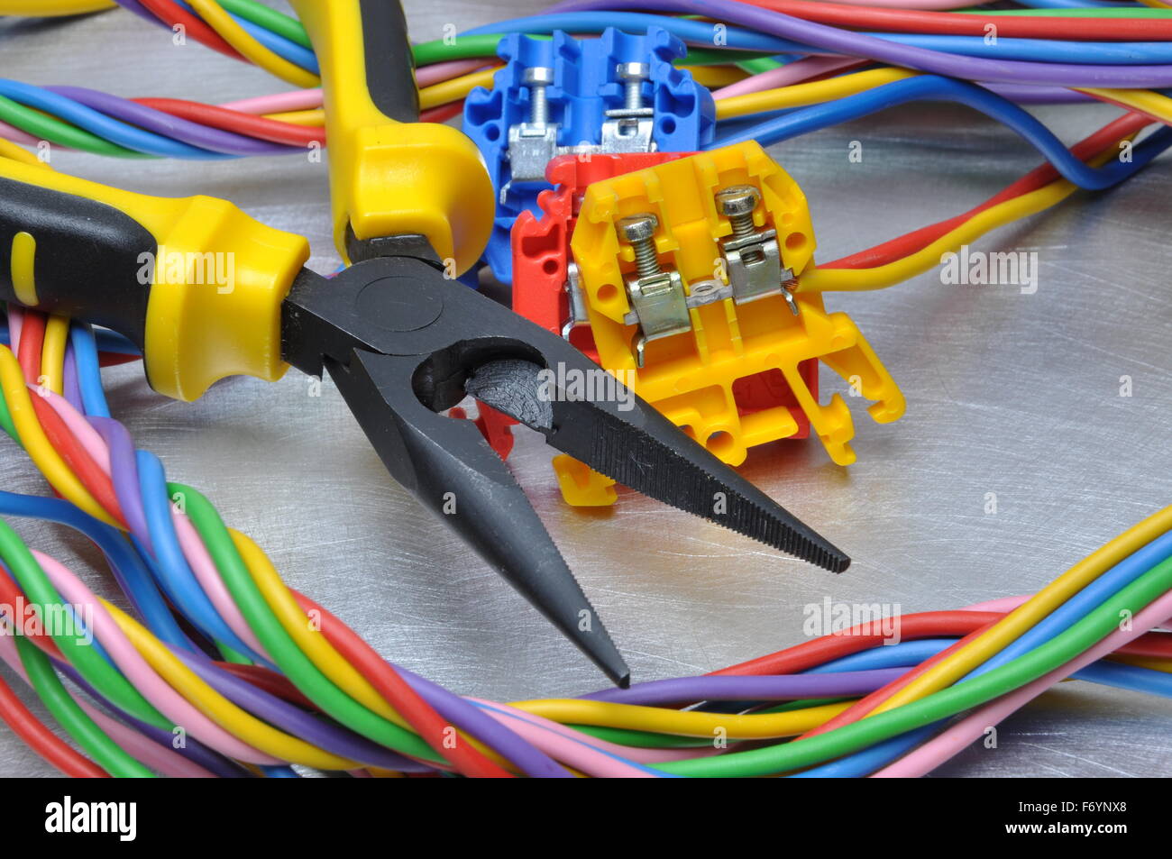 Set of electrical tools and cables on metal surface Stock Photo - Alamy
