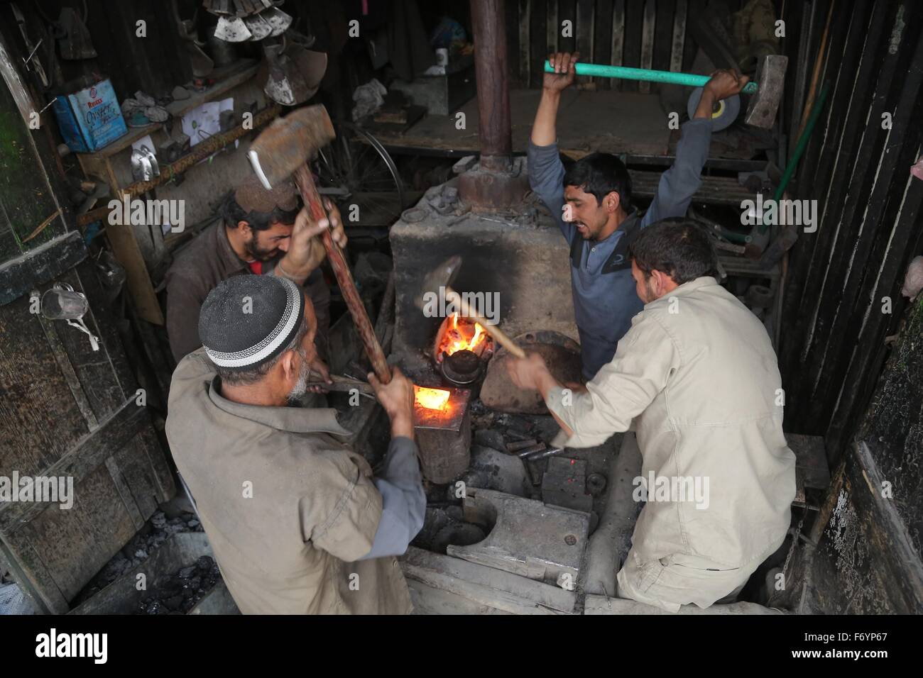 Kabul, Afghanistan. 22nd Nov, 2015. Afghan blacksmiths work at a ...