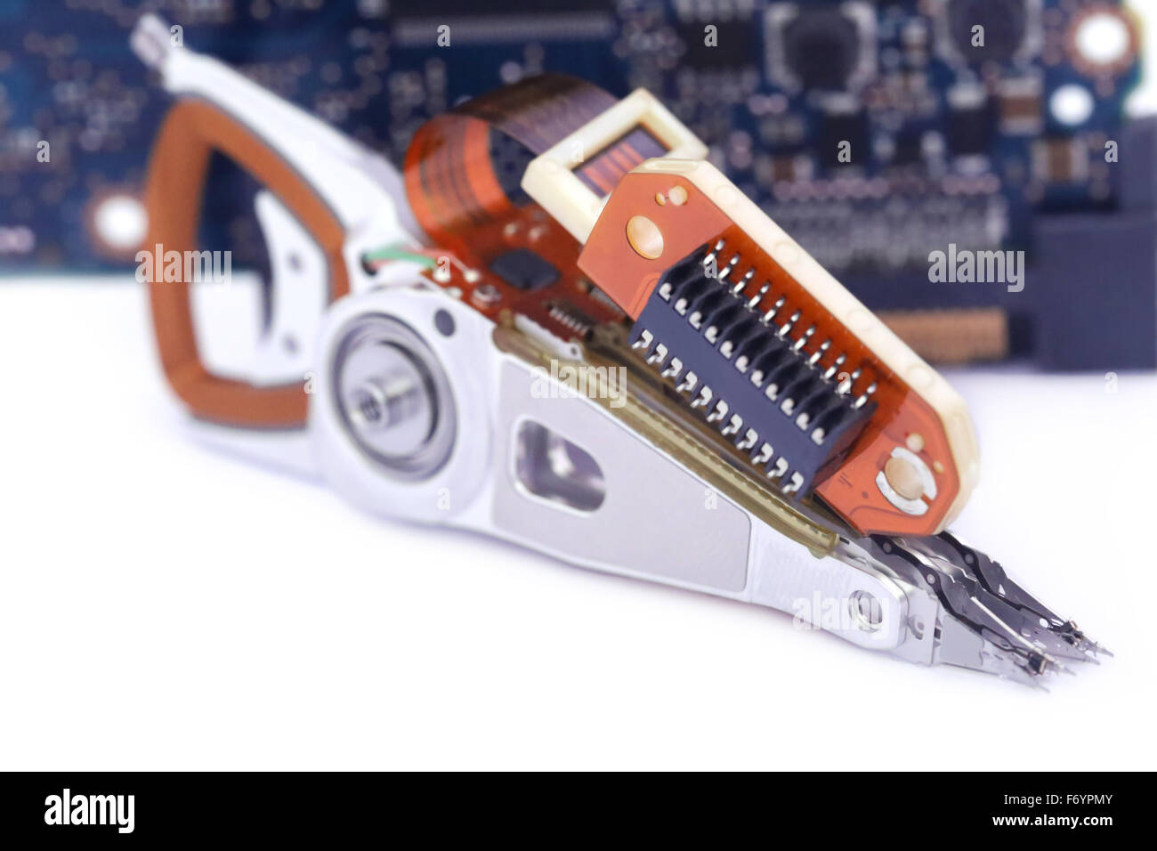 Open hard disk reader head with ciccuits over white background Stock ...