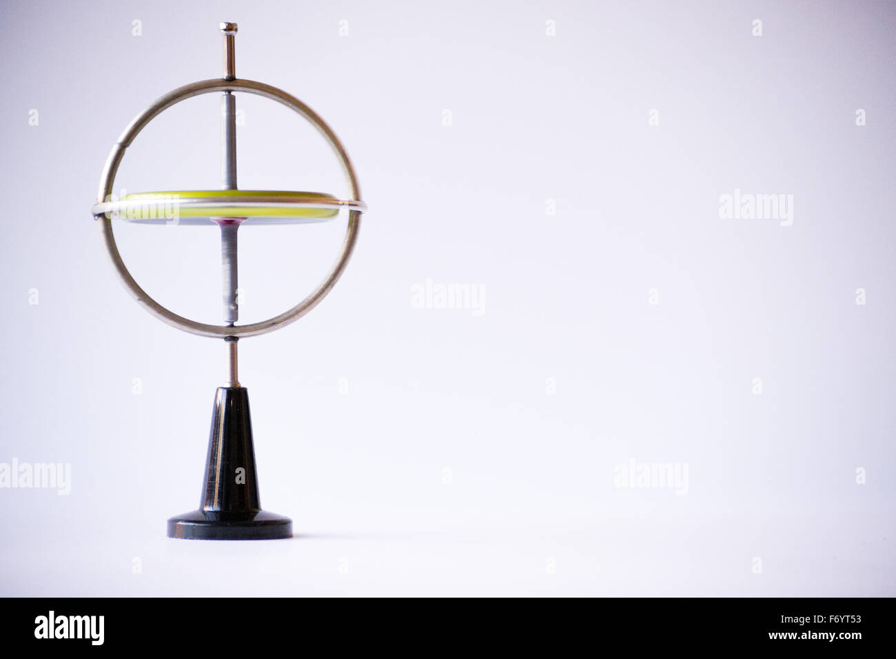 Gyroscope composed of a free rotating wheel and a spinning axis, uses ...