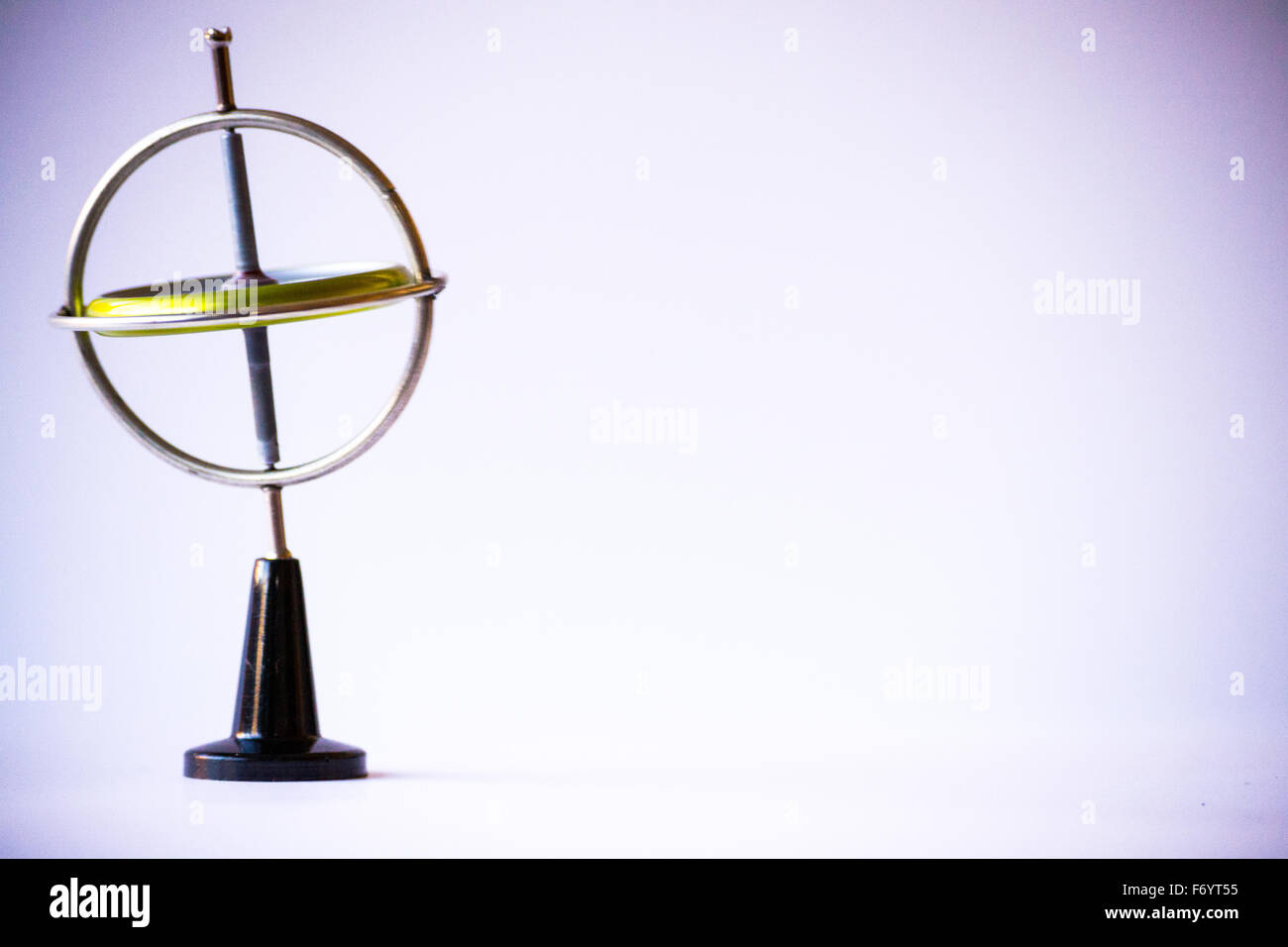 Gyroscope composed of a free rotating wheel and a spinning axis, uses ...