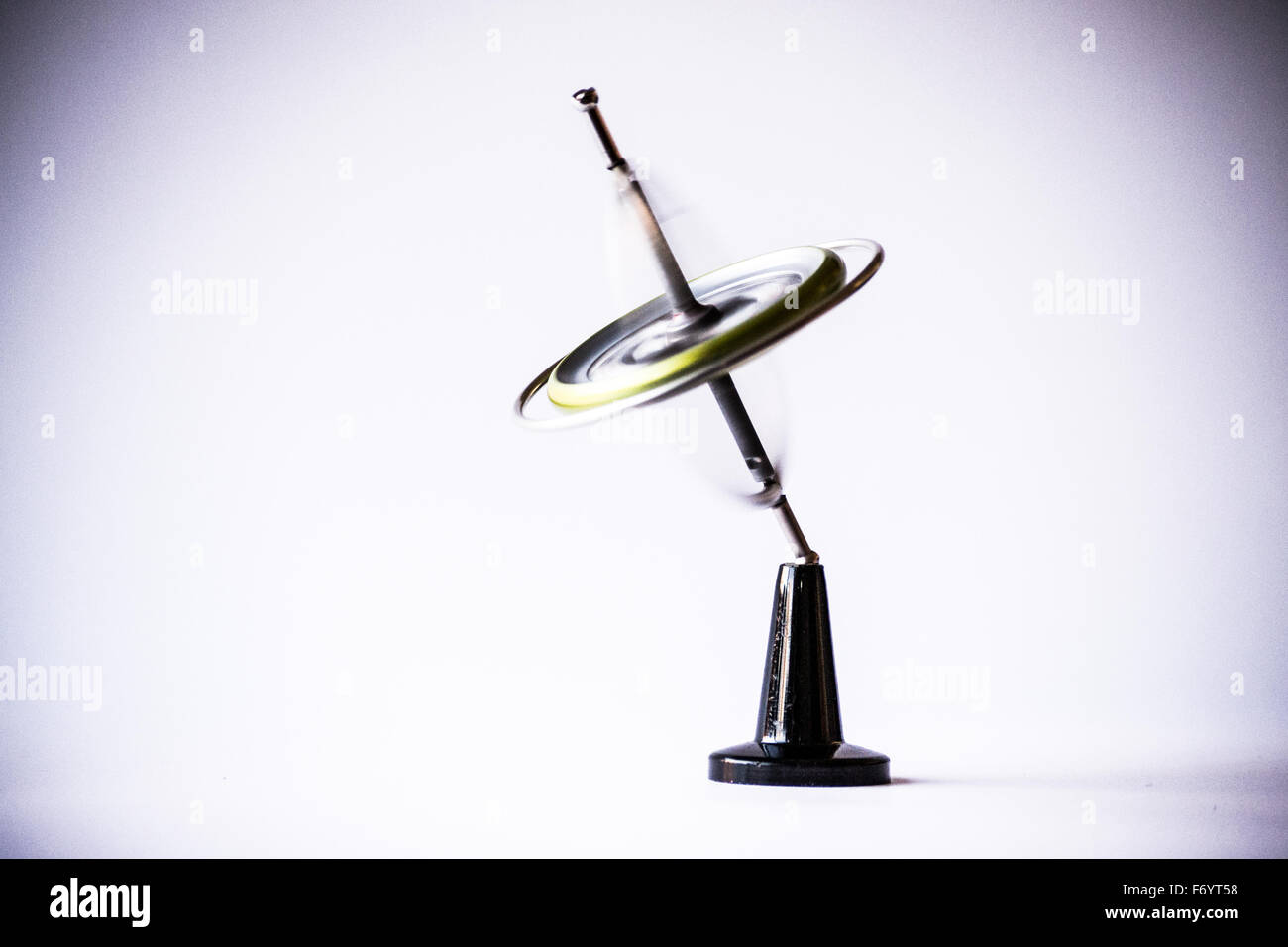 Gyroscope composed of a free rotating wheel and a spinning axis, uses ...