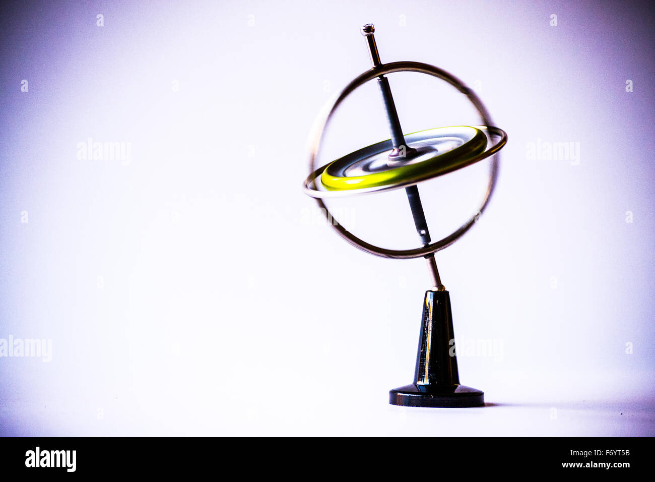 Gyroscope composed of a free rotating wheel and a spinning axis, uses ...