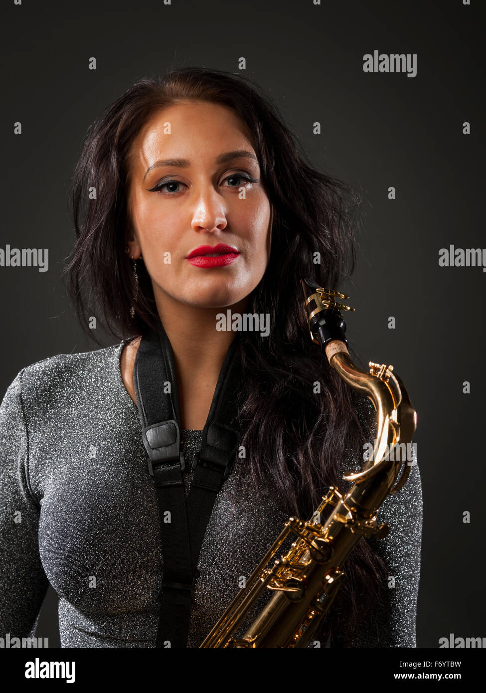 Saxophone female hi-res stock photography and images - Alamy