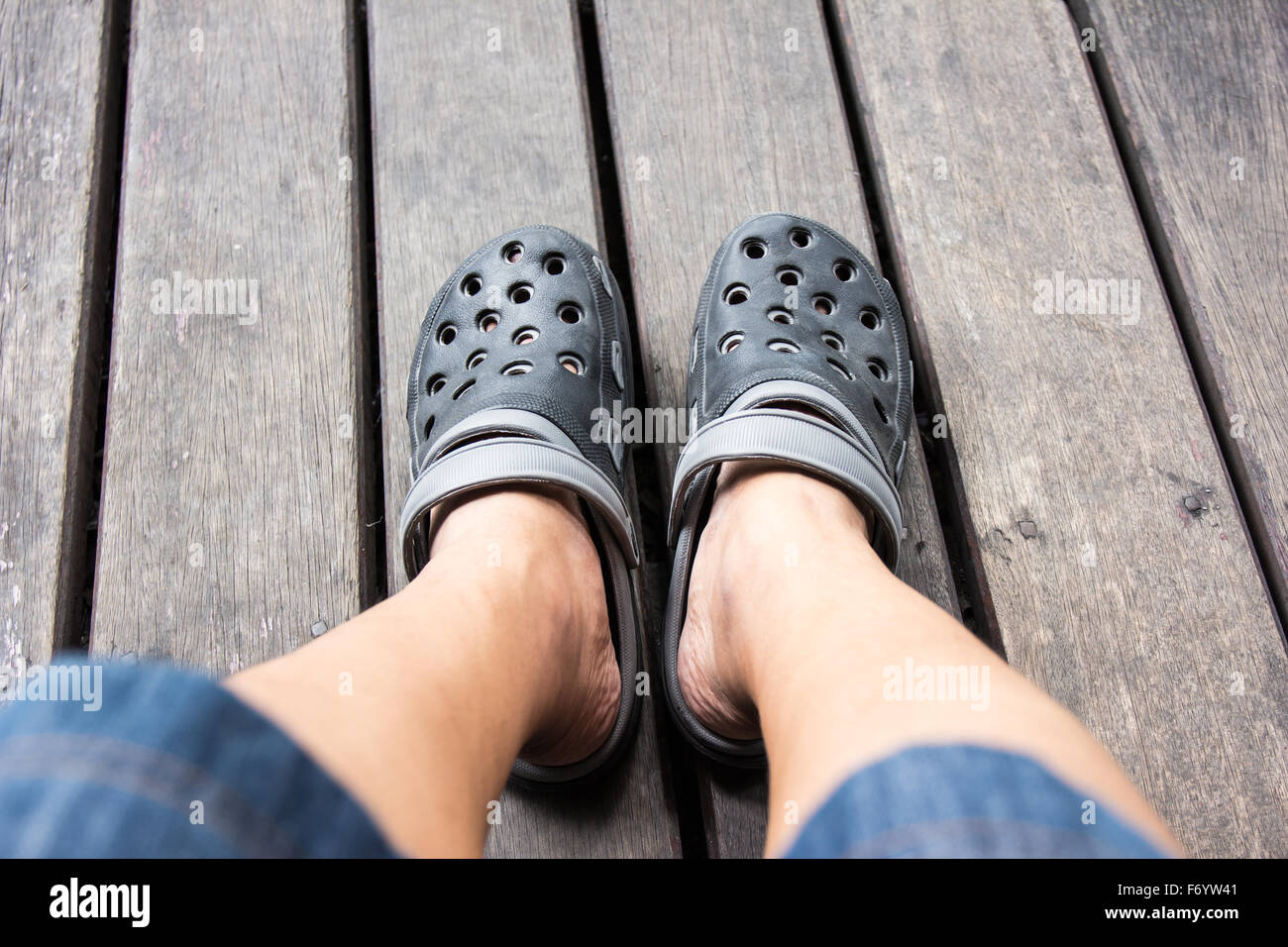Shoes from an aerial view on wooden background Stock Photo - Alamy