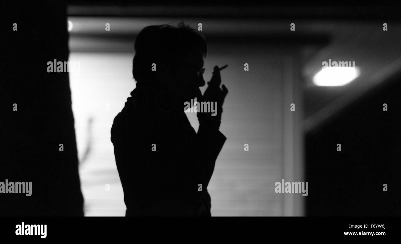 Smoker in the night Stock Photo - Alamy