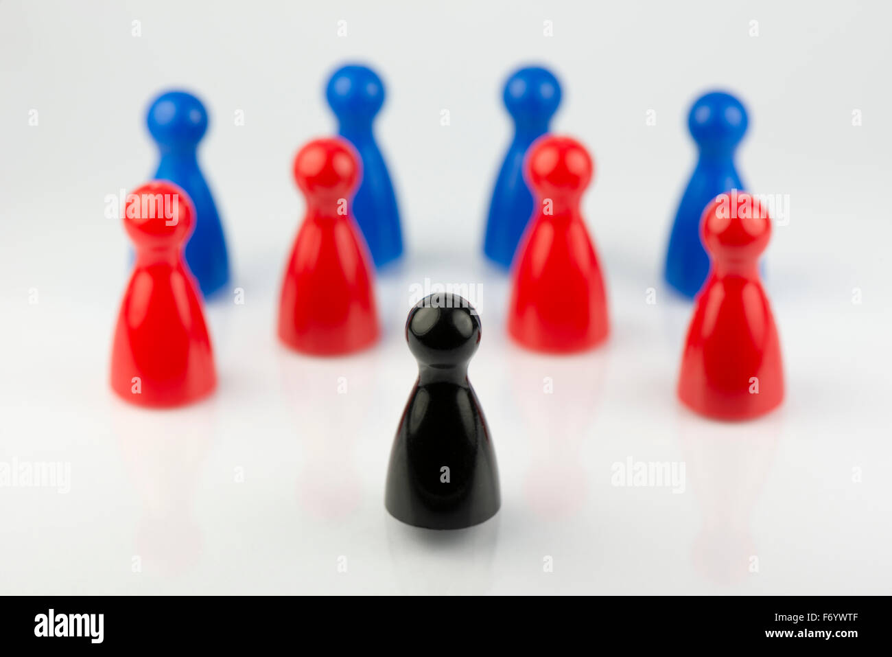 Conceptual game pawns that depict the concept different Stock Photo - Alamy