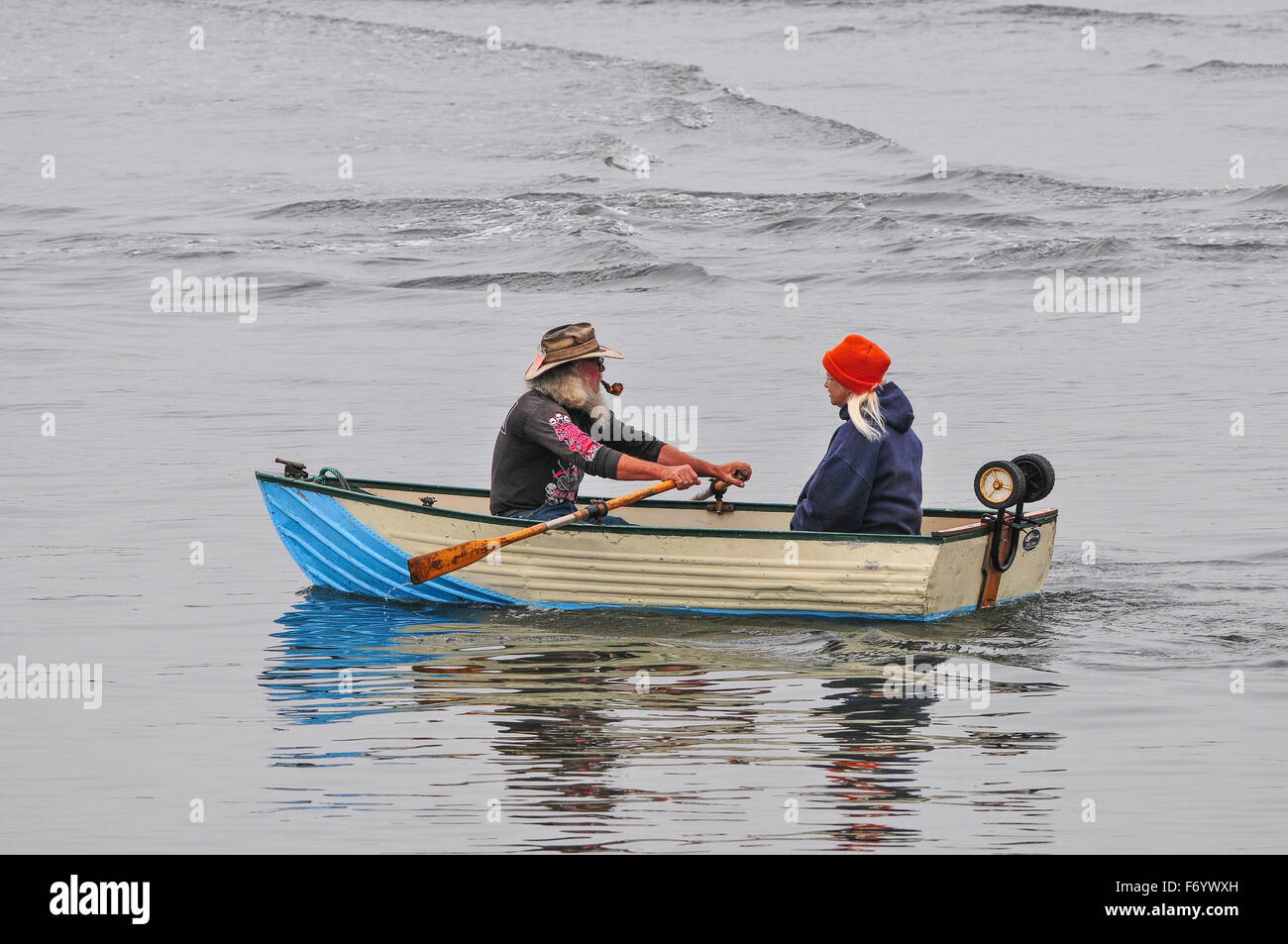 Man and woman rowing boat hi-res stock photography and images - Alamy