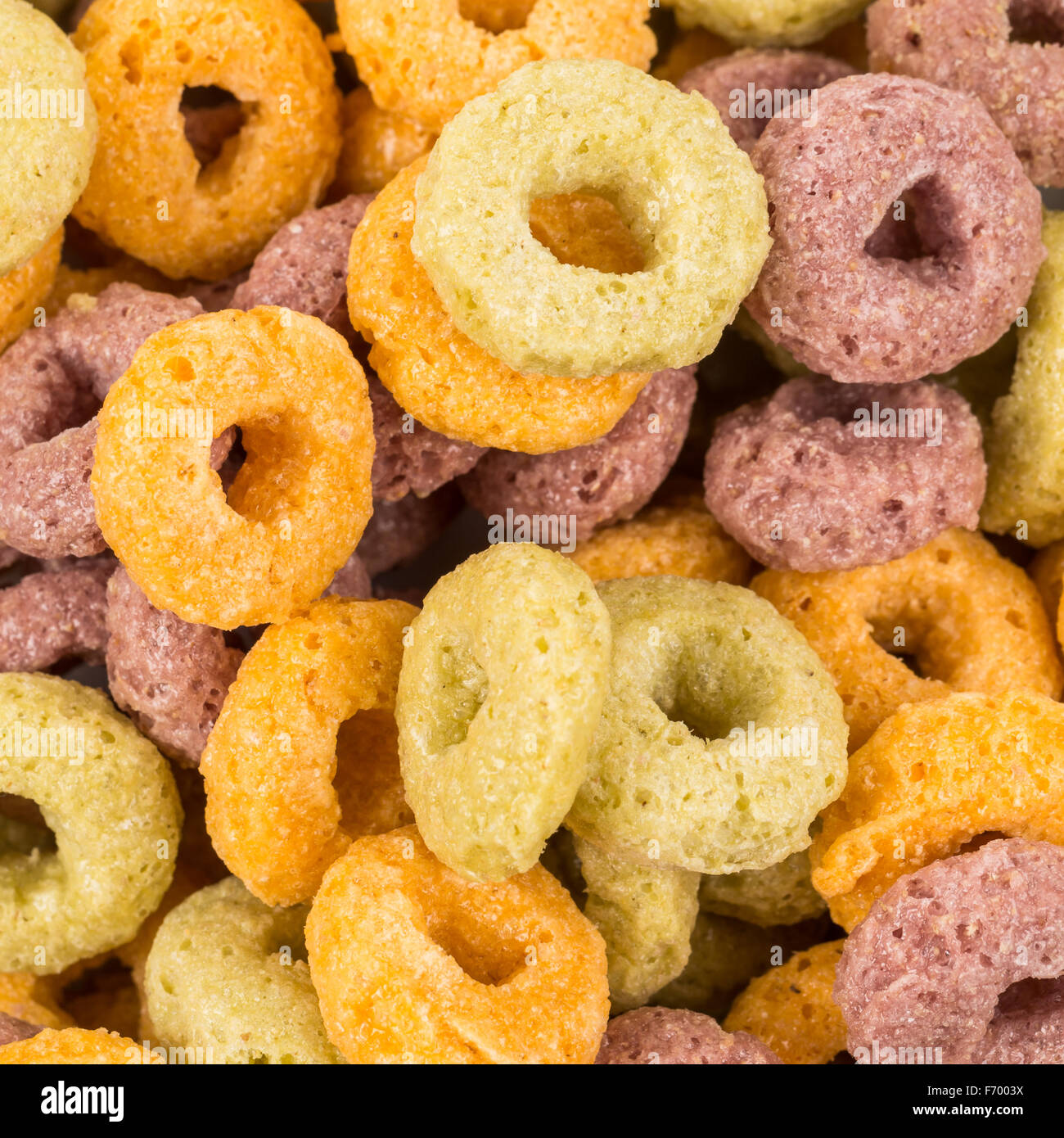 Close up image of colorful cereal against white background Stock Photo ...