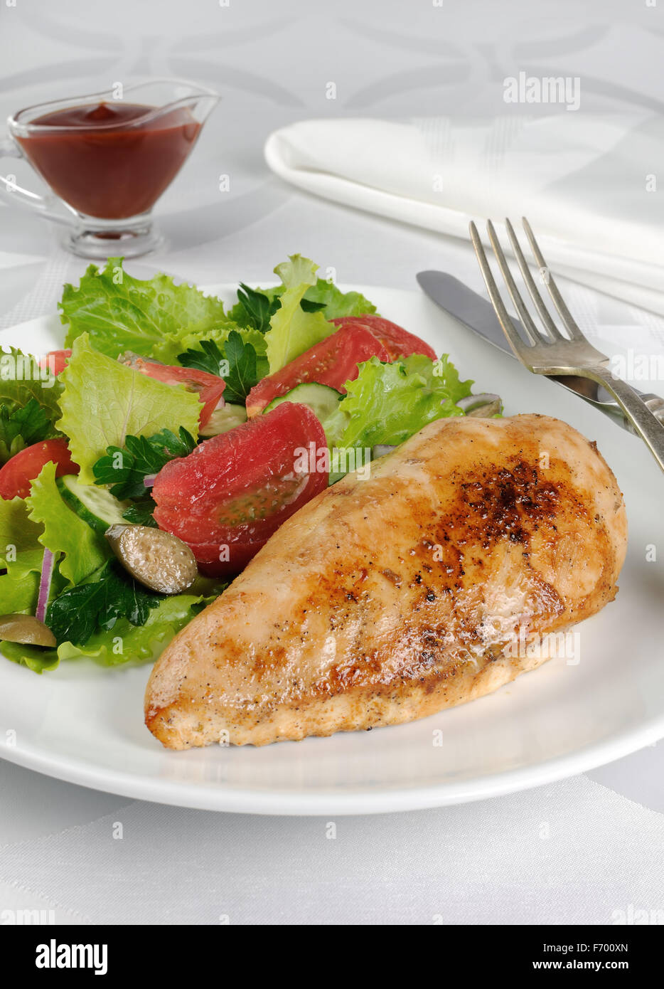 Tender chicken schnitzel with vegetable garnish Stock Photo - Alamy
