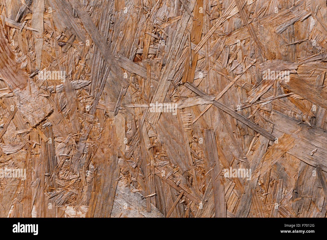 Old plywood recycled compressed wood chippings board background texture ...