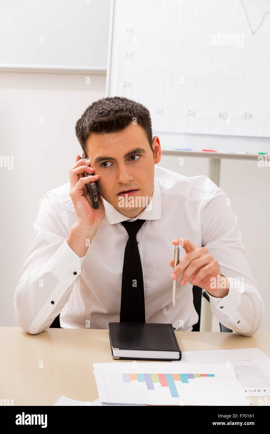 Manager works in the office Stock Photo - Alamy