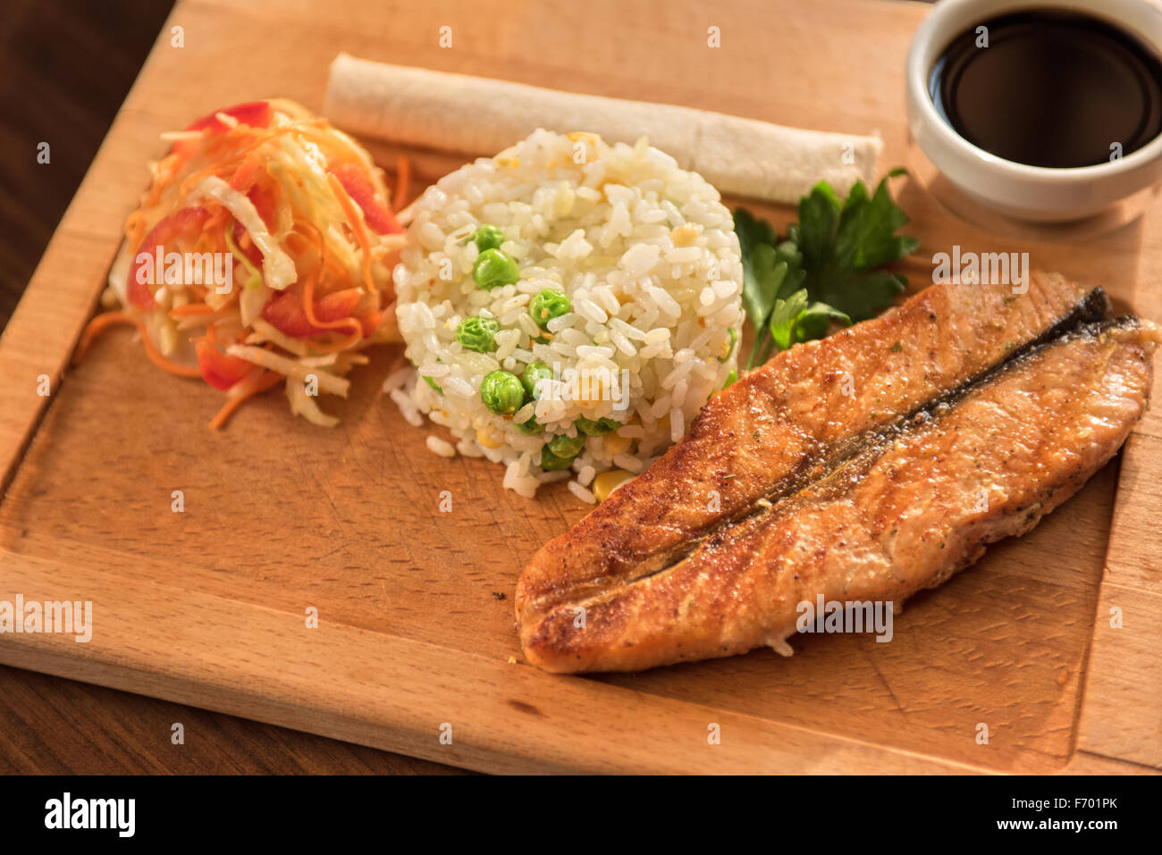 Grilled salmon with rice Stock Photo - Alamy